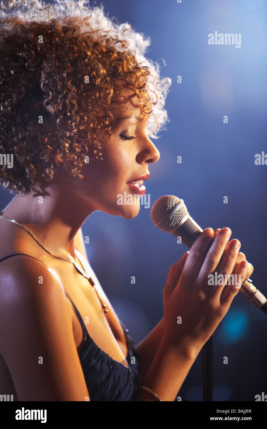 Female singer performing at jazz club hi-res stock photography and ...