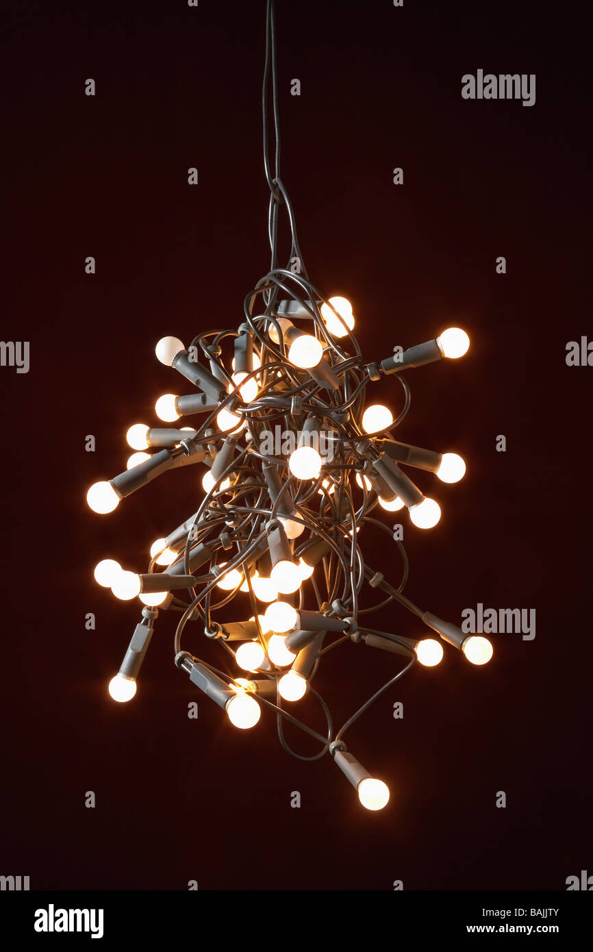 Tangled lights on black background Stock Photo - Alamy