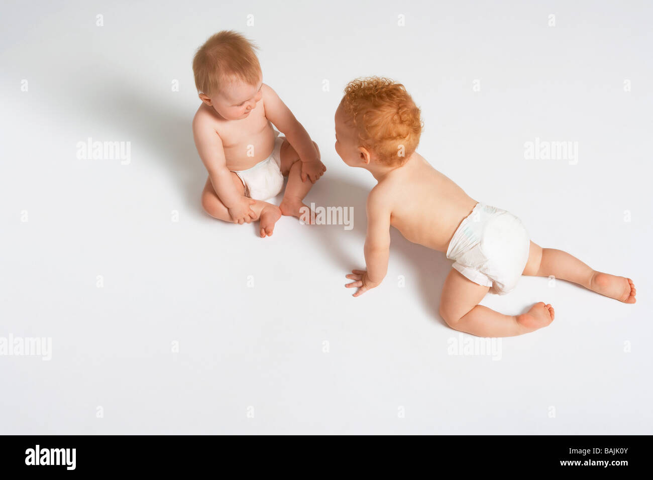 Two Babies Meeting Stock Photo - Alamy