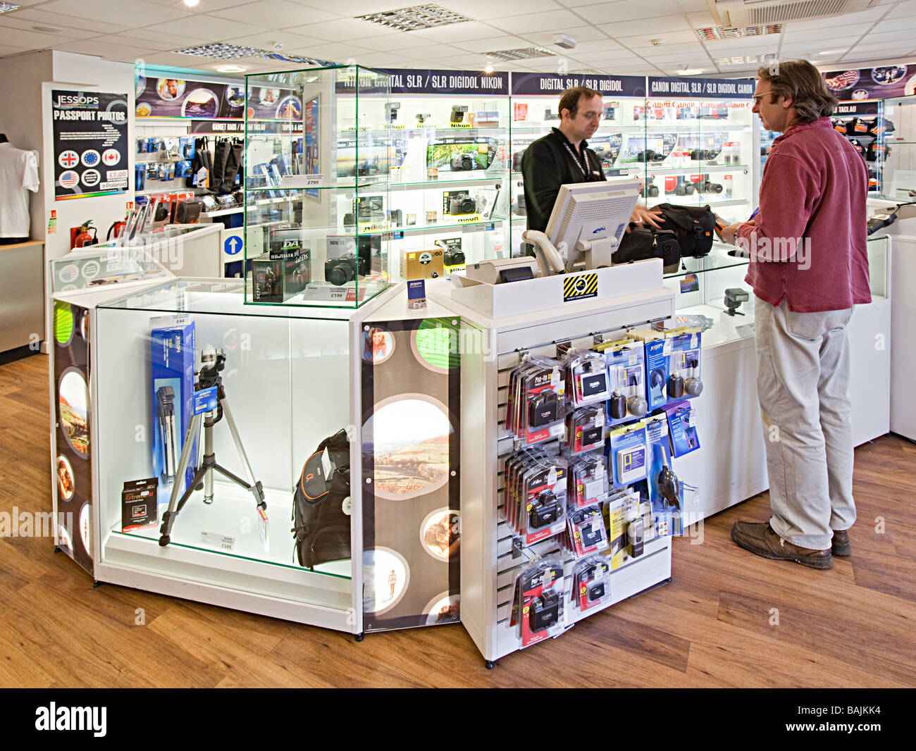 Shopping in camera store UK Stock Photo - Alamy