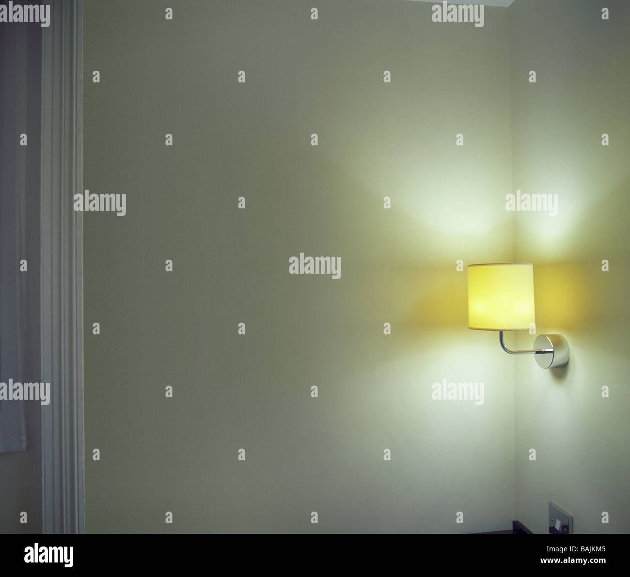Sconce Shining Light onto Corner in Room Stock Photo - Alamy