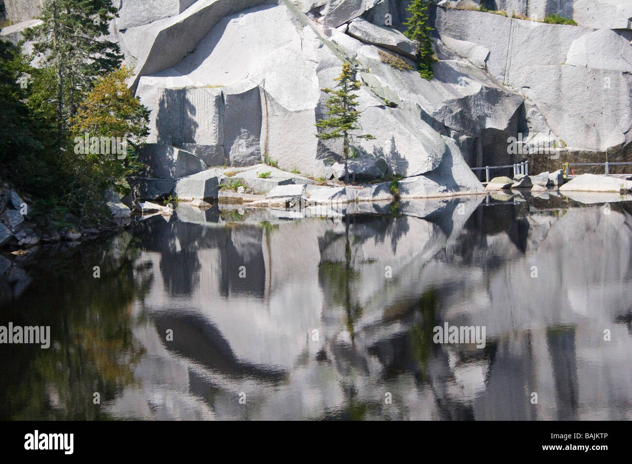 Granite Quarry filled with water Stock Photo - Alamy