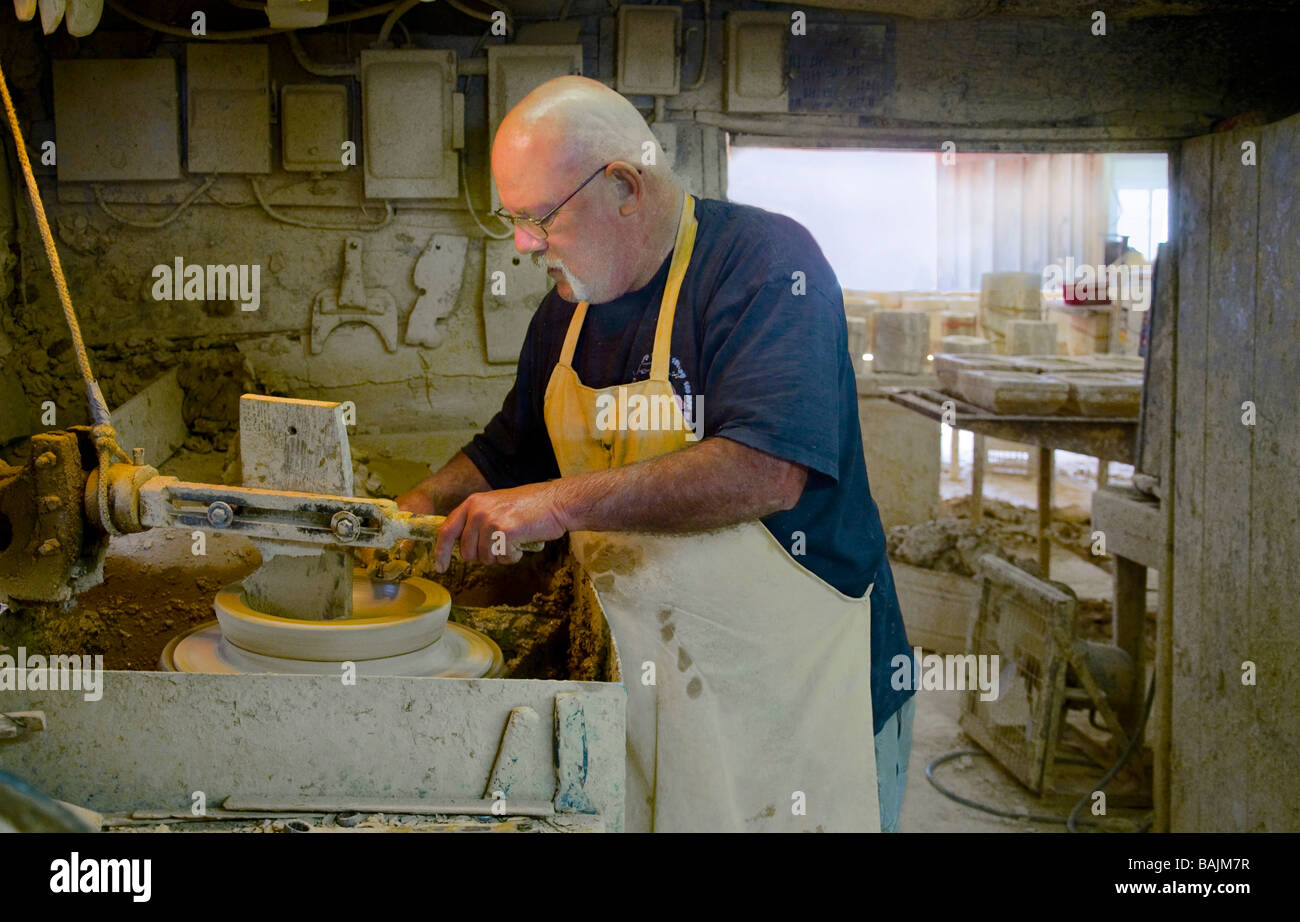 Craftsman making pottery at the famous Bybee Pottery in Bybee Kentucky ...