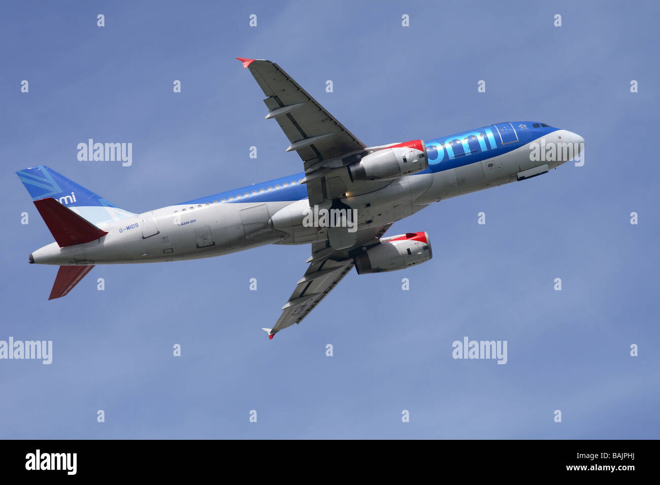 BMI Airbus A320 aircraft plane taking off flying from Heathrow airport ...