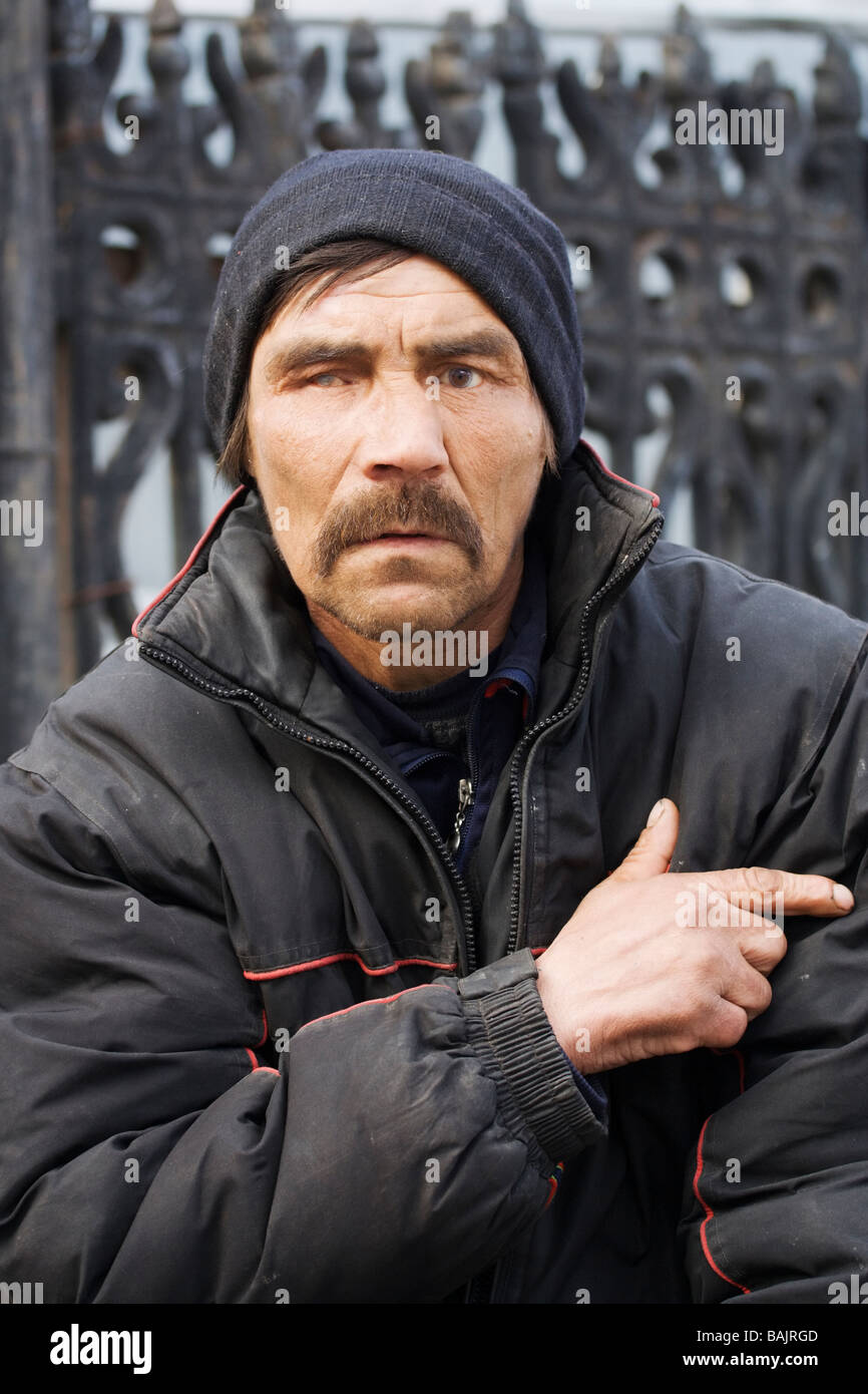 Homeless man on a city street Stock Photo - Alamy