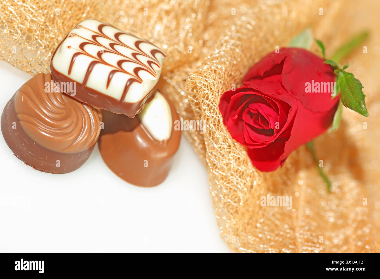 Red Rose with chocolate candy Stock Photo - Alamy