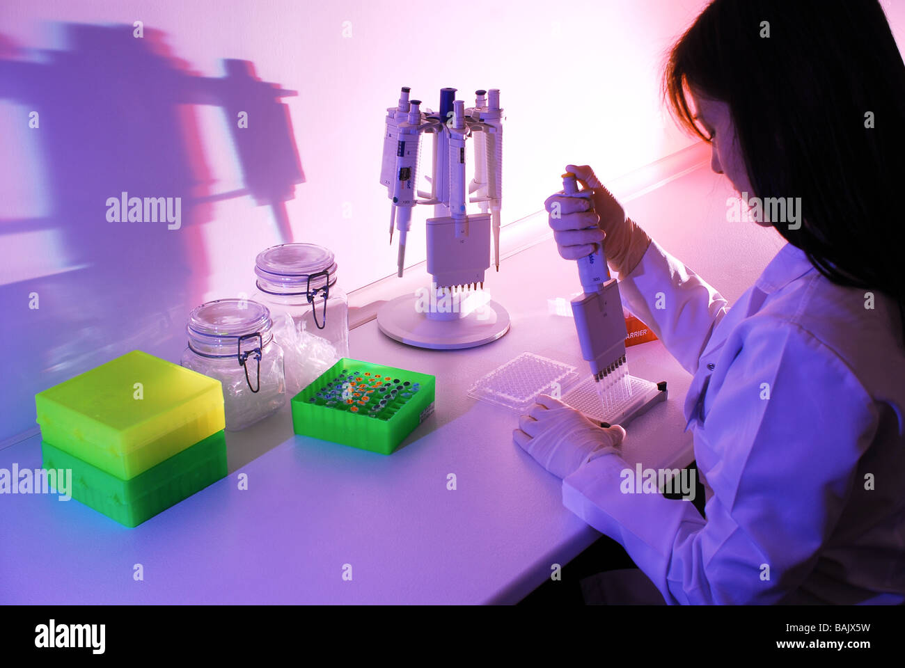 scientist researching at the laboratory Stock Photo - Alamy