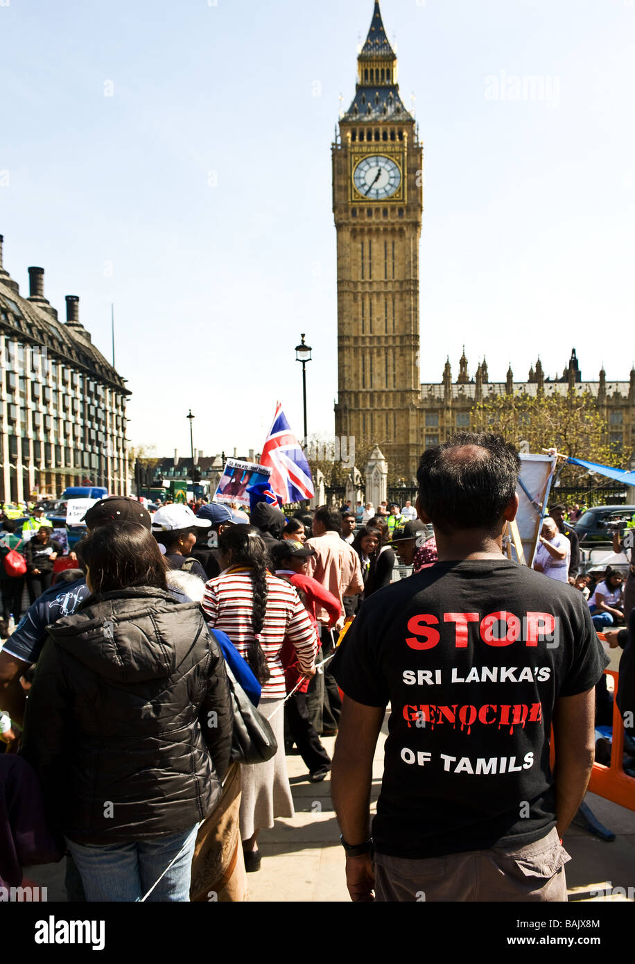 A Tamil male protestor standing in front of Big Ben at a demonstration ...