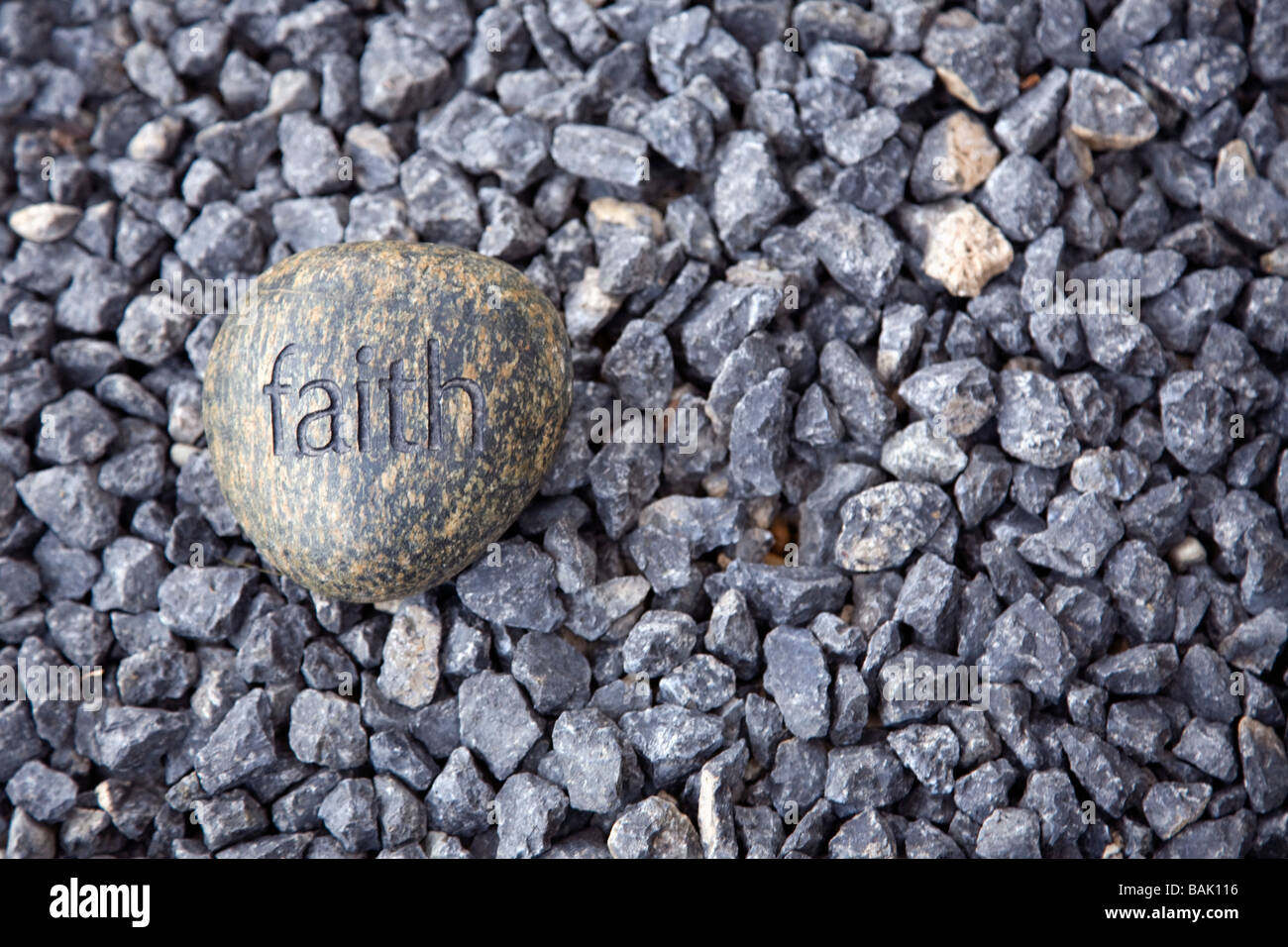 Big rock among small rocks Stock Photo - Alamy