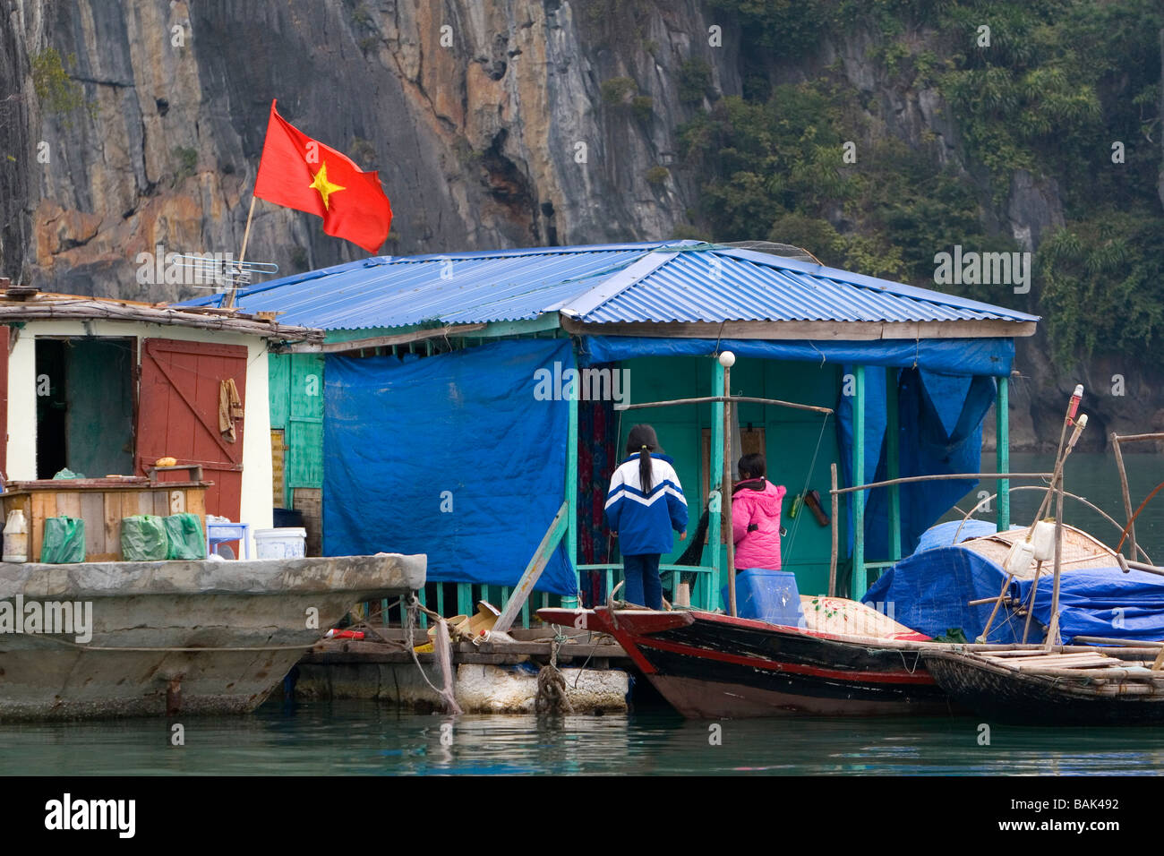 Floating village in Ha Long Bay Vietnam Stock Photo - Alamy
