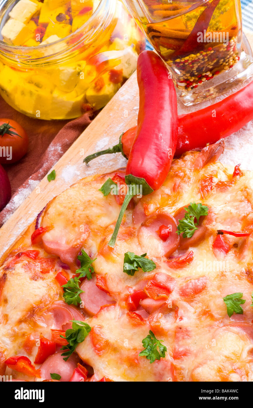 cheese and tomato pizza with rocket Stock Photo - Alamy