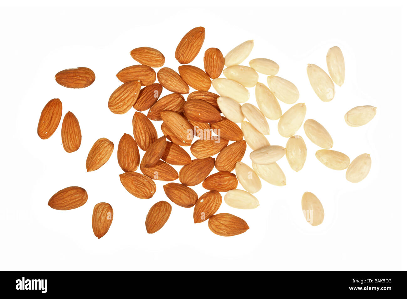 Pile of mixed almonds isolated on white Stock Photo - Alamy