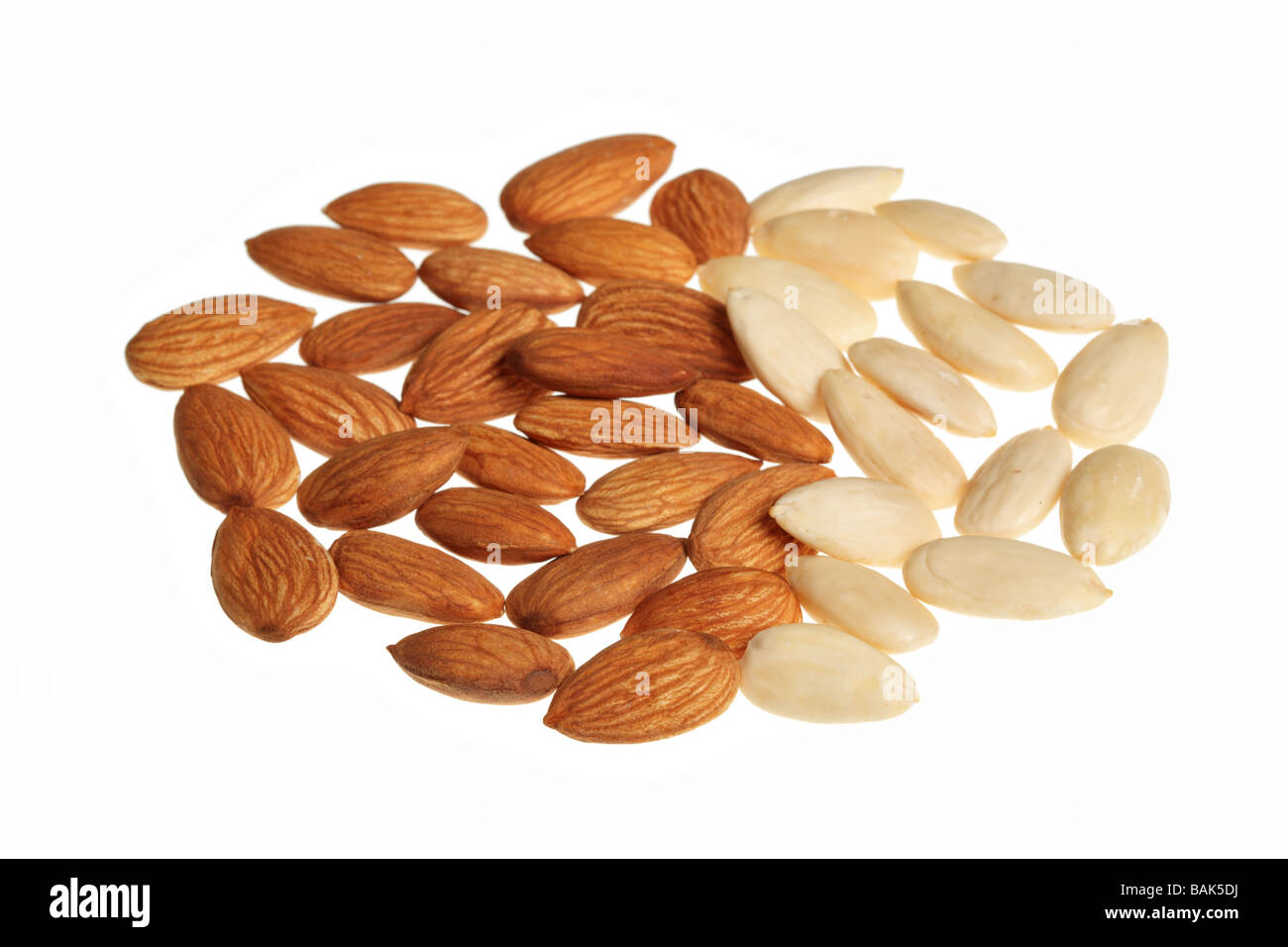 Pile of mixed almonds isolated on white Stock Photo - Alamy
