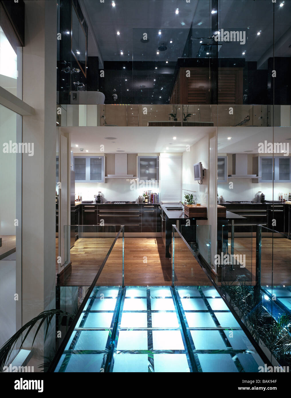 private house interior view - around glass bridge in atrium Stock Photo ...