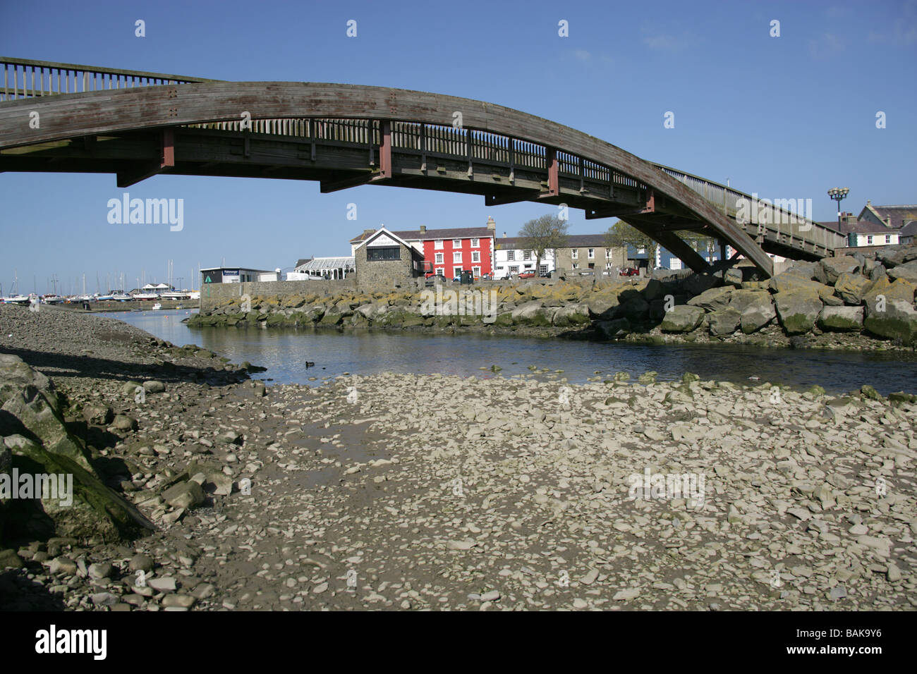 Town of Aberaeron, Wales. Wooden bridge over the River Aeron with ...