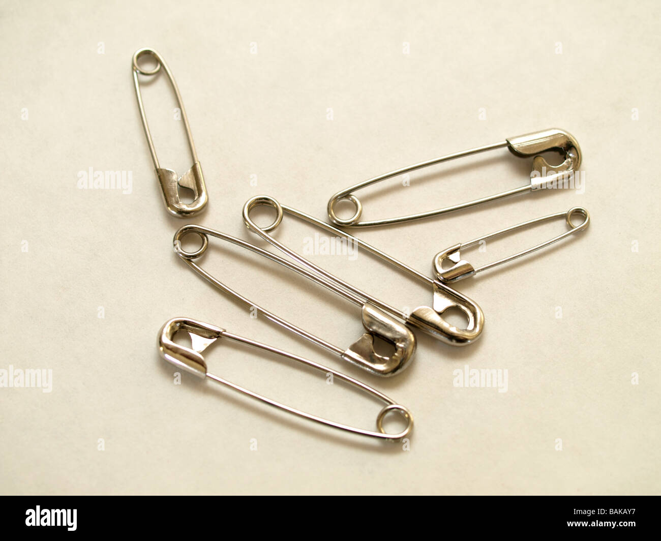 A collection of safety pins for sewing or mending Stock Photo - Alamy