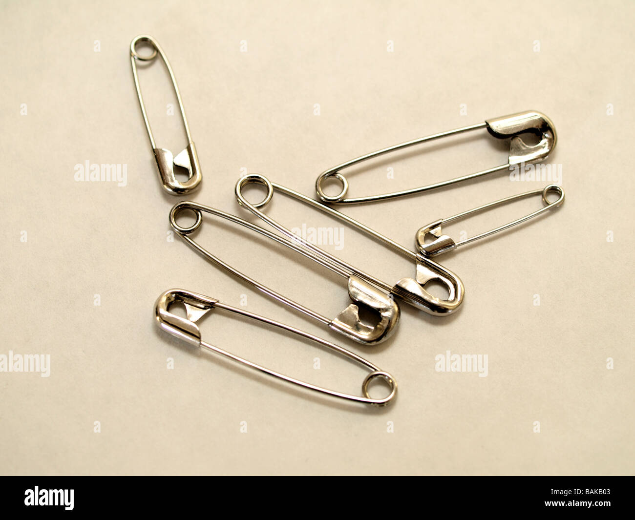 A collection of safety pins for sewing or mending Stock Photo - Alamy