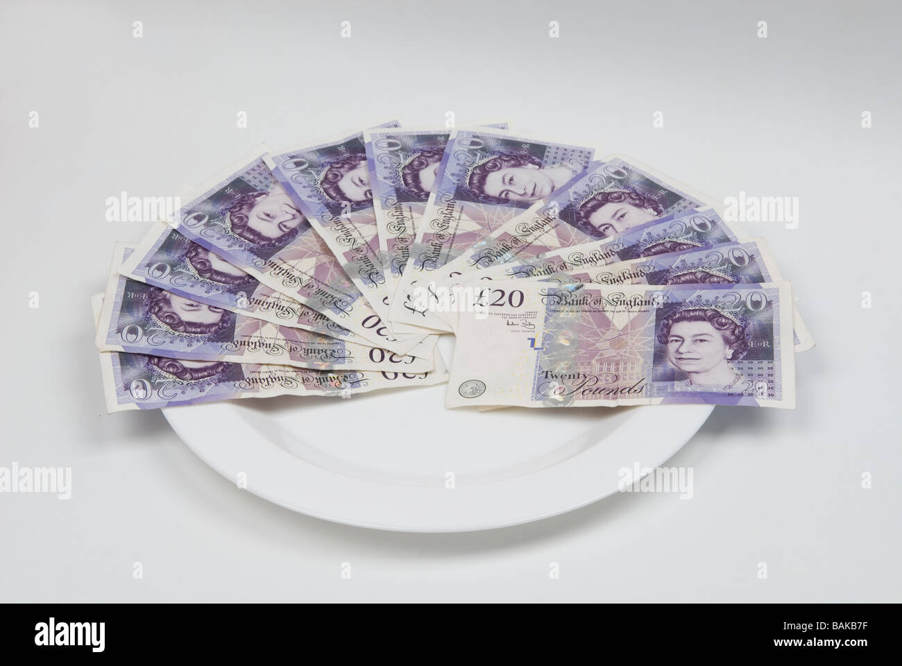 Money on plate cutout hi-res stock photography and images - Alamy