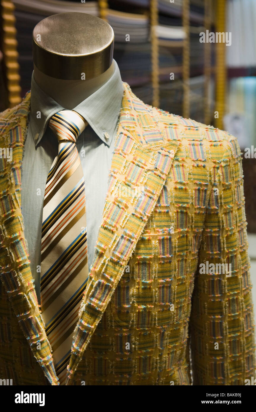 A intricate men's suit on display in a shop window Stock Photo - Alamy