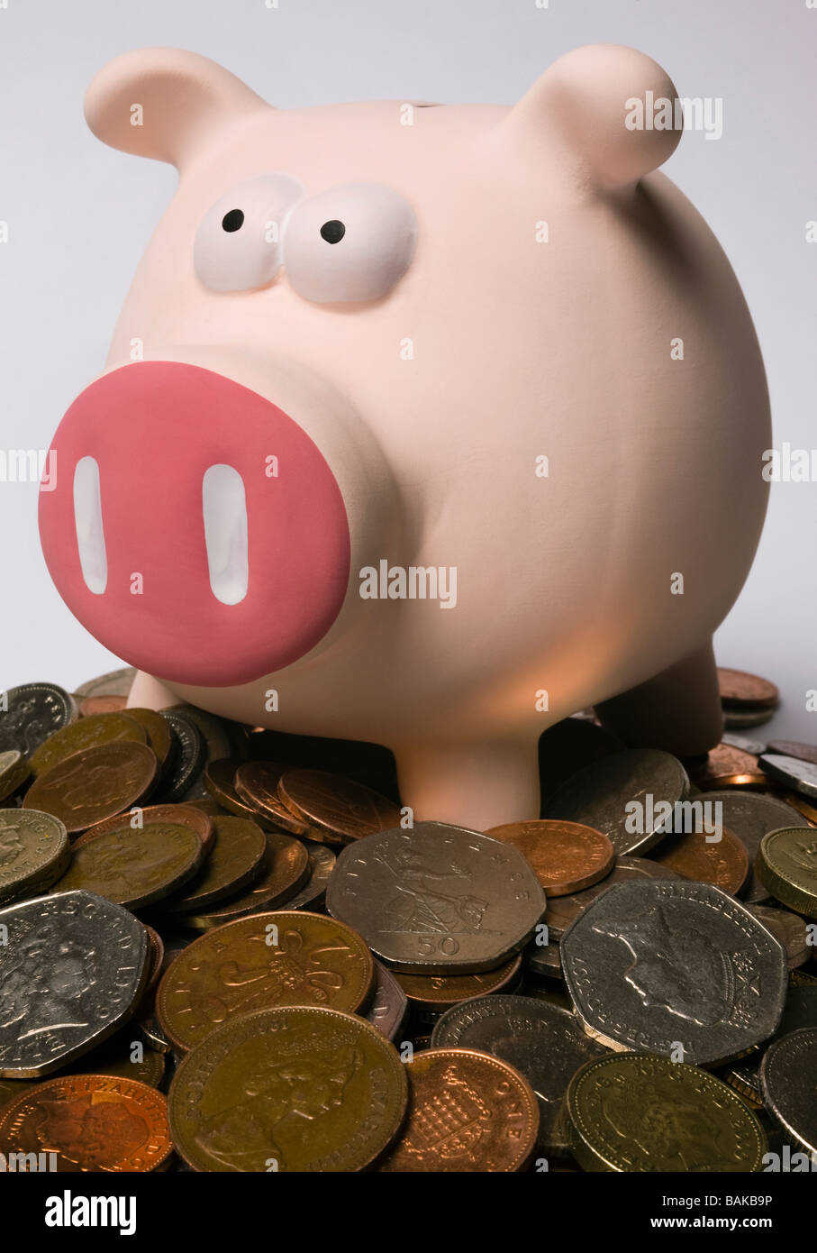 Piggy bank coins hi-res stock photography and images - Alamy