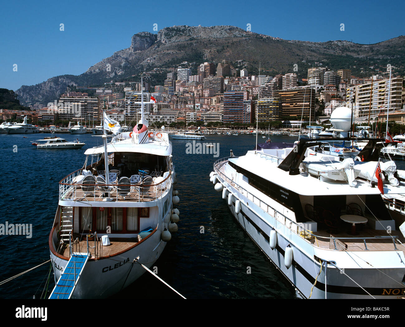 Luxury motor cruisers docked at the harbour Monte Carlo Monaco MC MCO ...