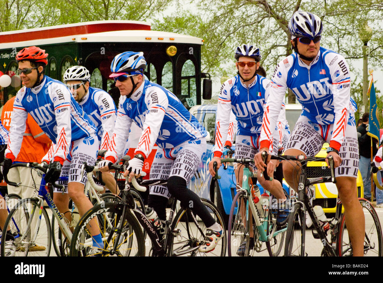 Taem of cyclists in Chicago Polish Parade Stock Photo - Alamy