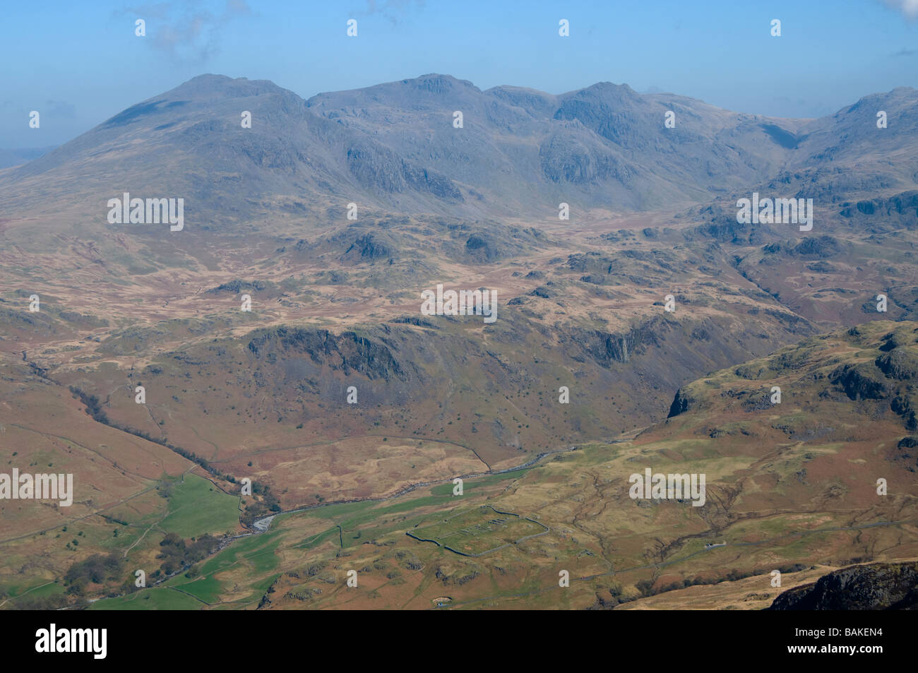 Hardknott Castle with the Scafell range of Cumbrian Mountains in the ...