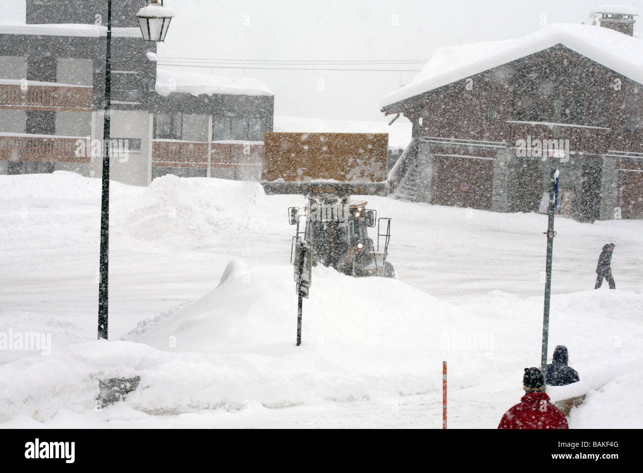 Tractor clearing snow val thorens hi-res stock photography and images ...