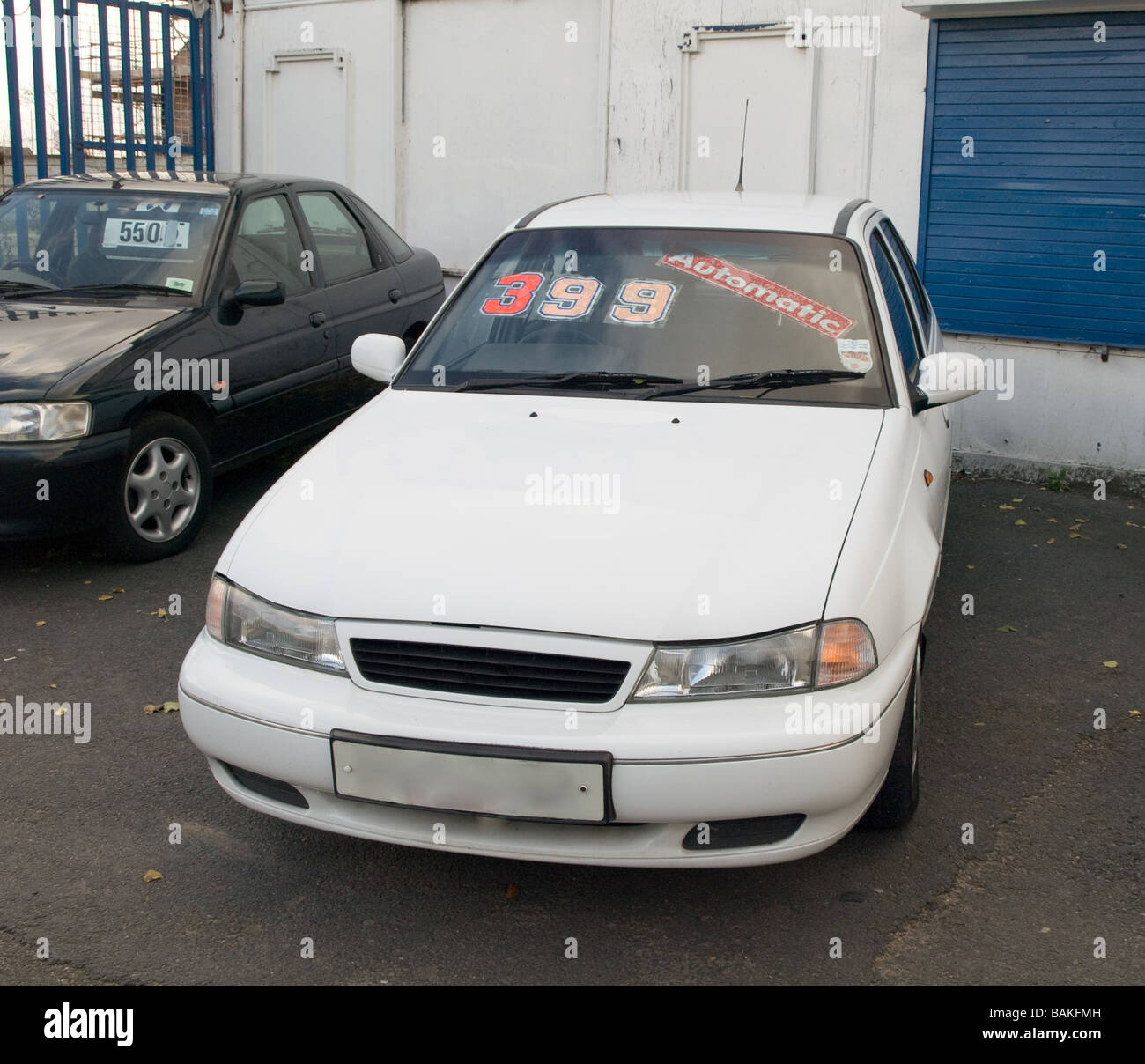 Cheap Affordable Budget White Car with Price Stock Photo - Alamy