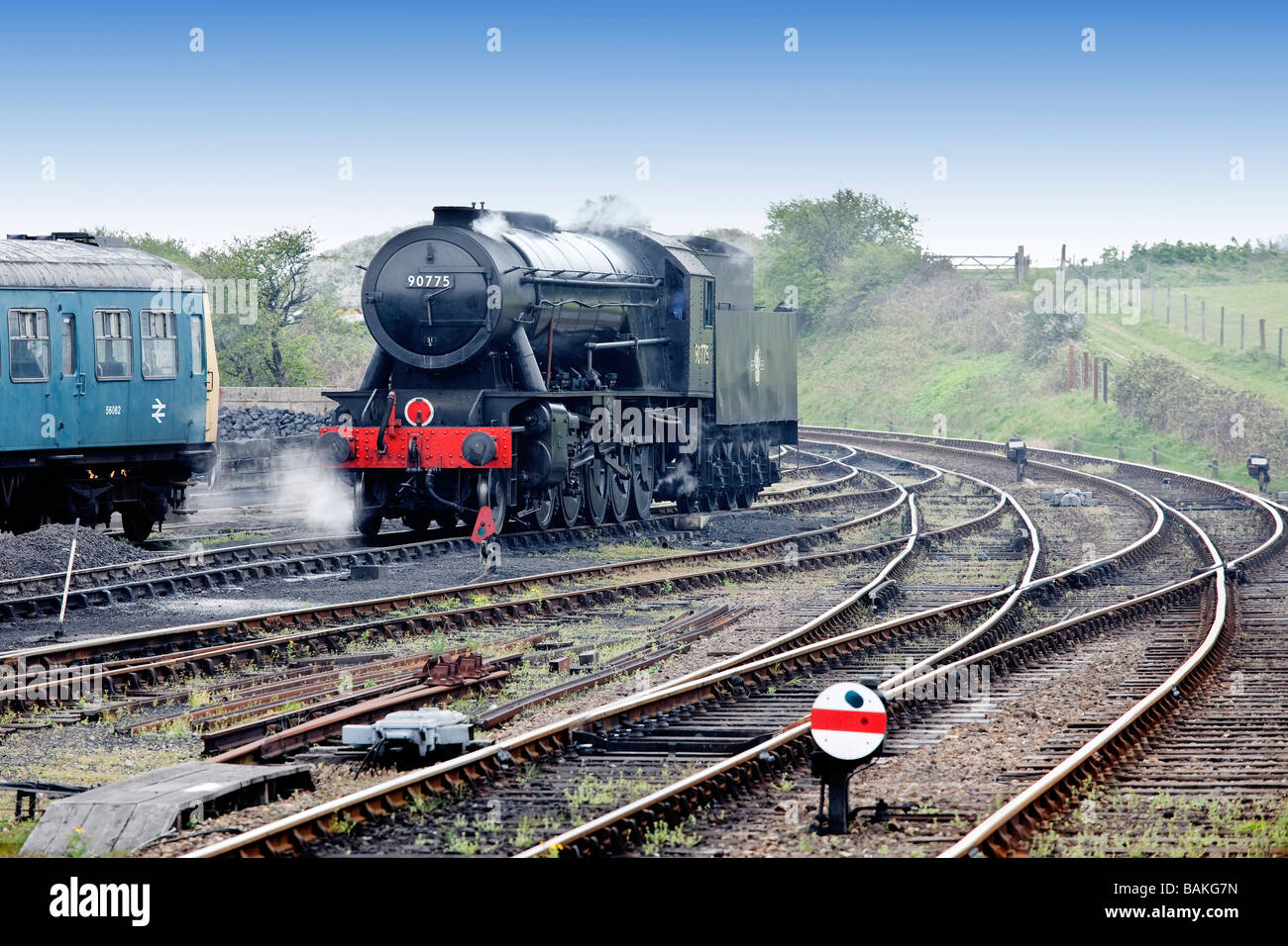 A "Steam Locomotive" sits at "Weybourne Station" on the "North Norfolk ...