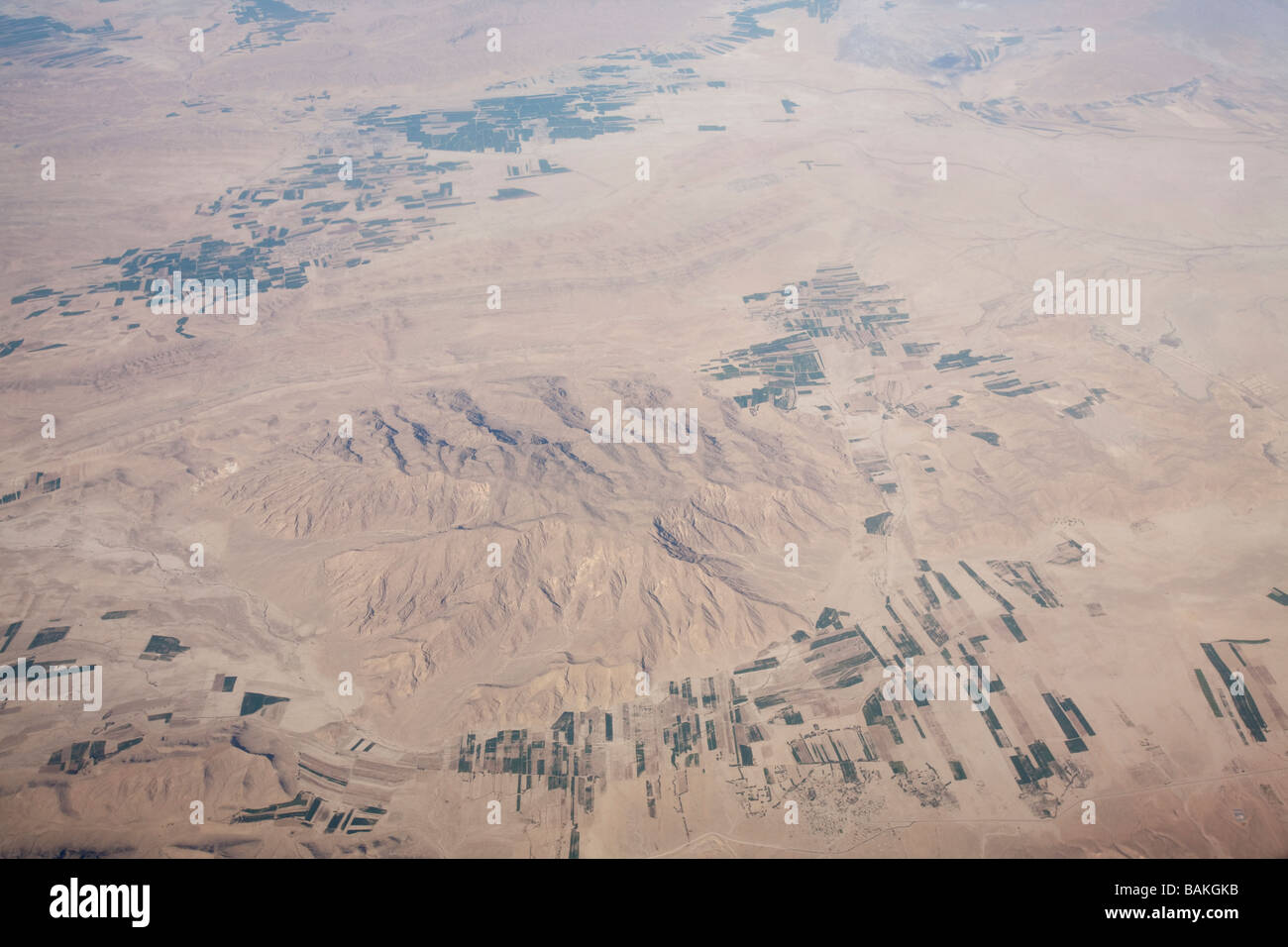 Flying over Iran showing the geology and irrigated fields Stock Photo ...