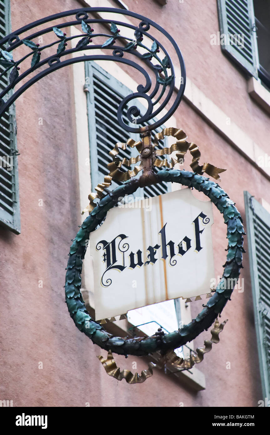wrought iron sign luxhof colmar alsace france Stock Photo - Alamy