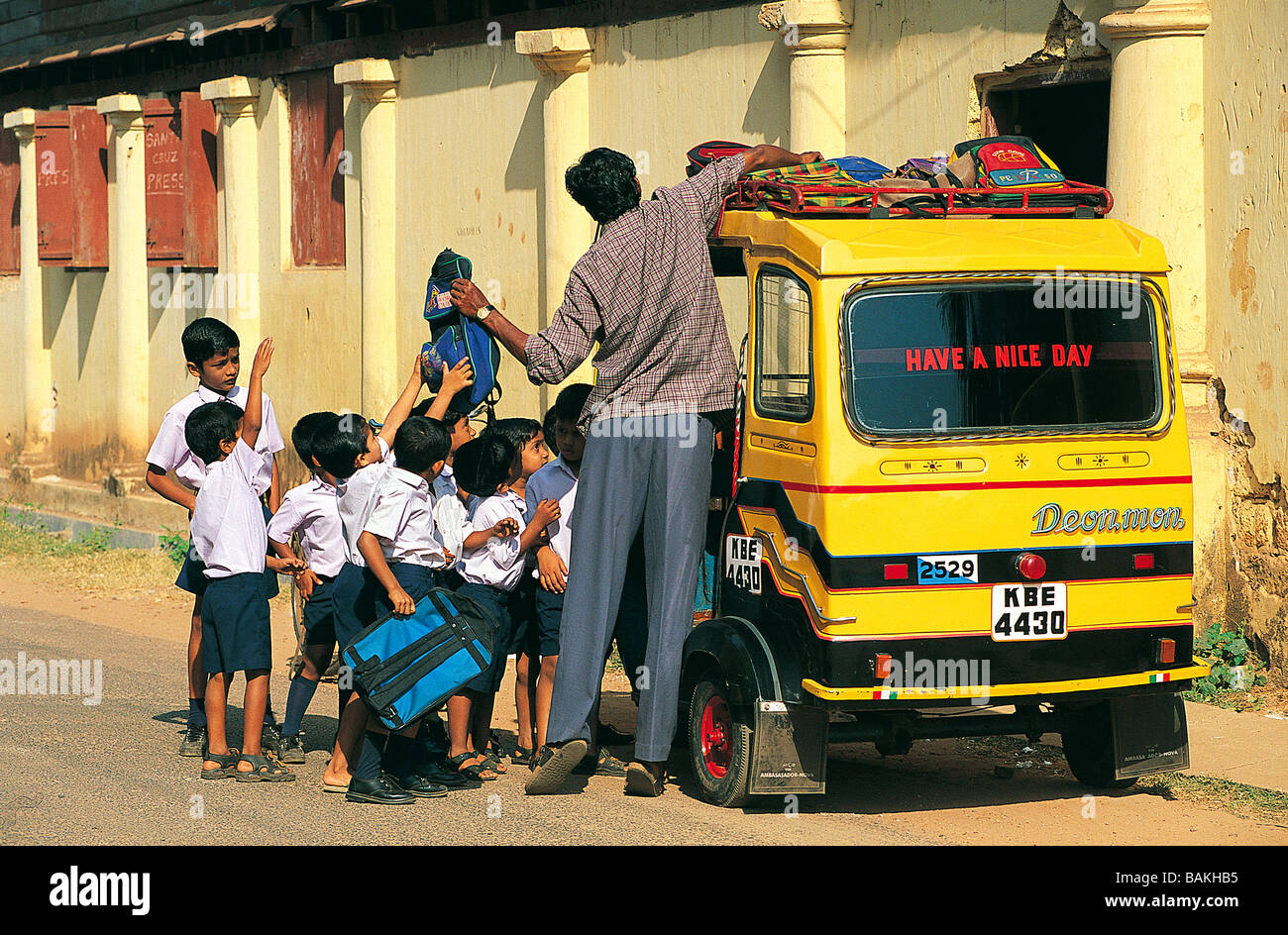 India, Kerala State, Kochi, Fort Kochi, children arriving at school ...