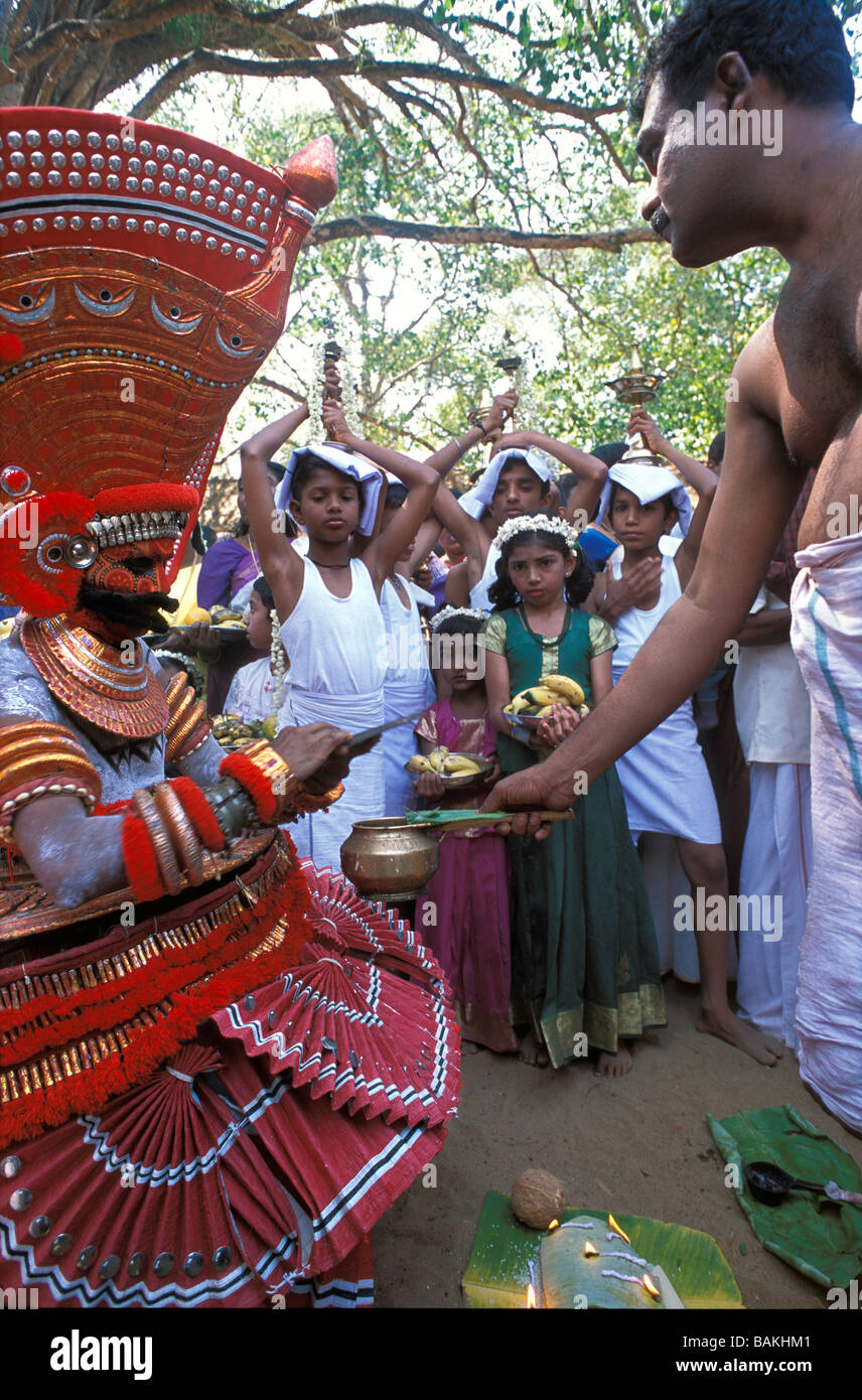 India, Kerala State, Dharmadam, Andalur Temple, offering of betel ...