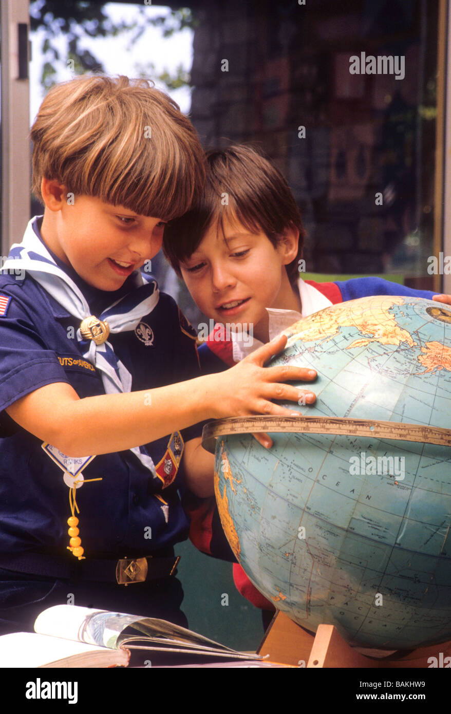 Two boy student world globe geography locate map country nation find ...