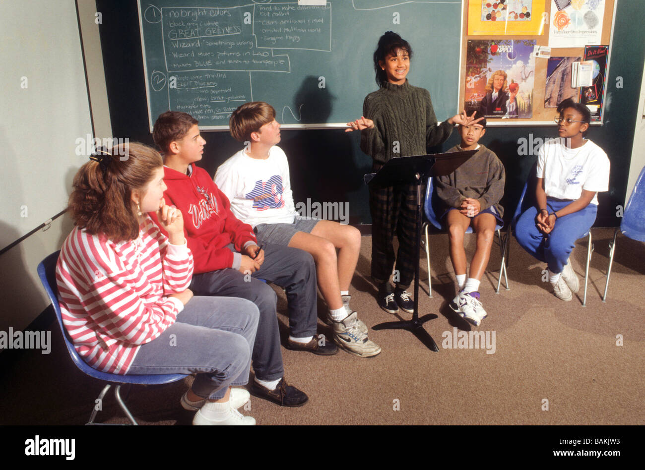 Mix race student group speak class talk lecture report demonstrate ...