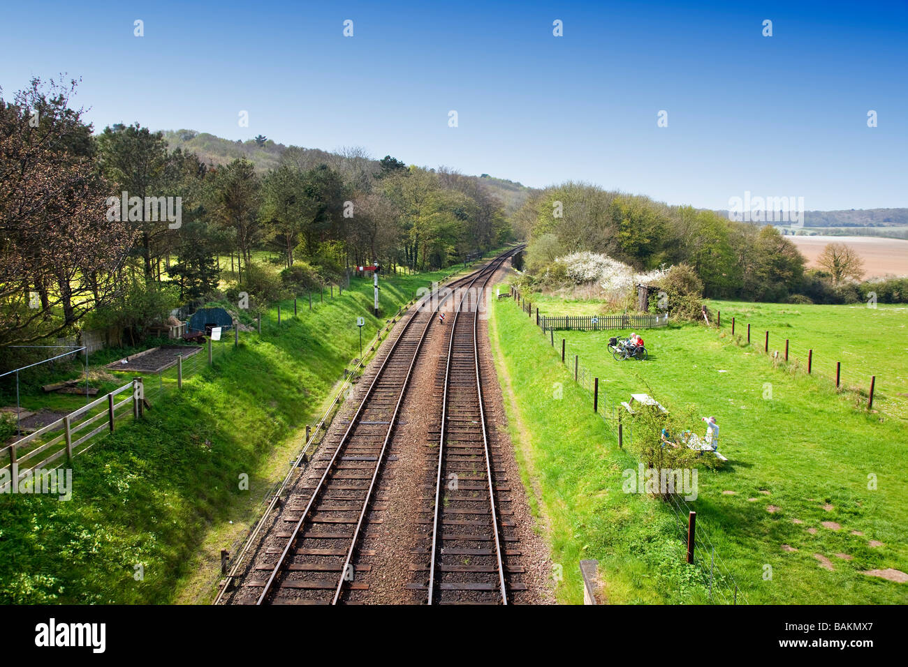 A "Steam Locomotive" approaching "Weybourne Station" on the "Poppy Line ...