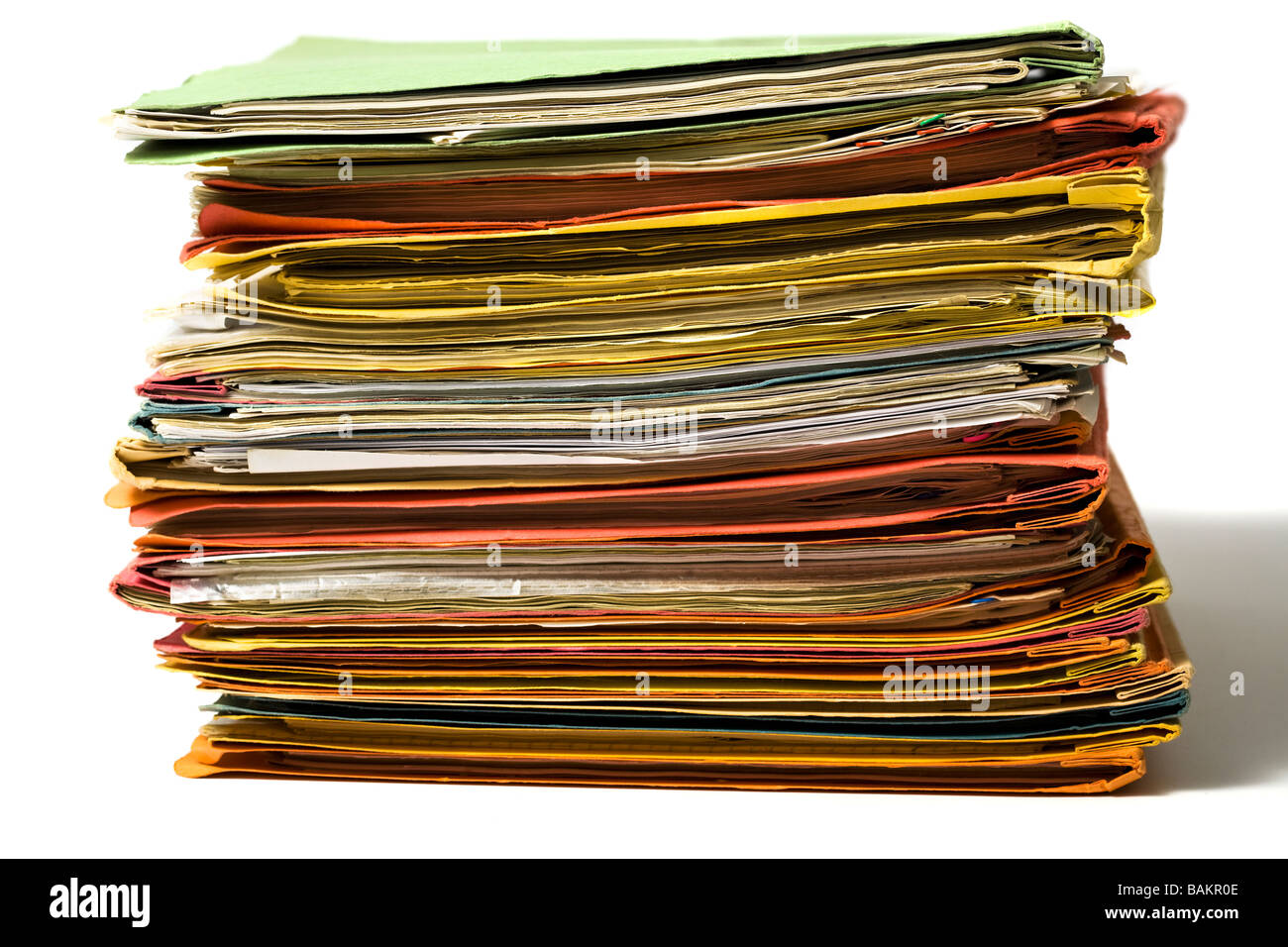stack of stuffed file folders in various colors Stock Photo - Alamy