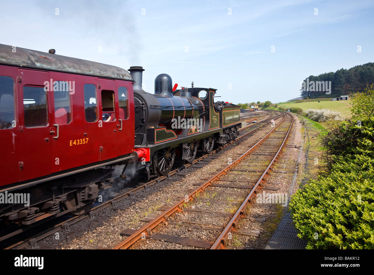 A "Steam Locomotive" sits at "Weybourne Station" on the "North Norfolk ...