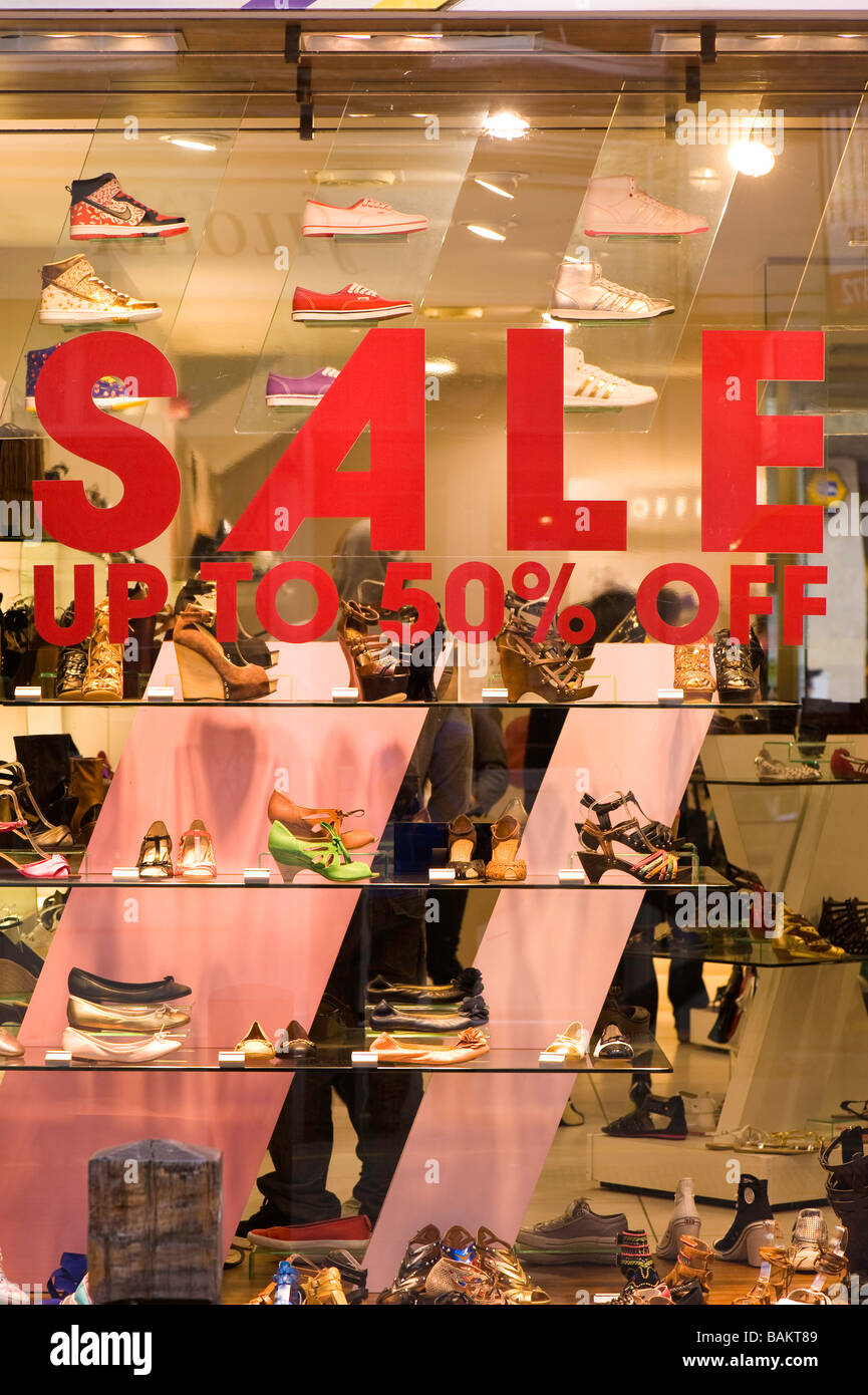 Sale sign in shop window London United Kingdom Stock Photo - Alamy