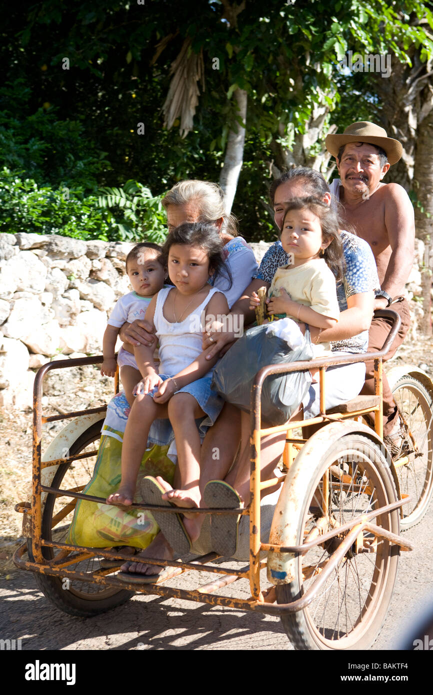 Family on a rickshaw in Yucatan Mexico Stock Photo - Alamy