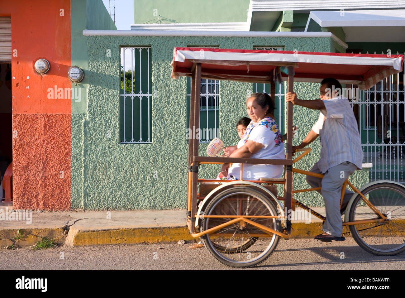 Family on a Rickshaw in Yucatan Mexico Stock Photo - Alamy