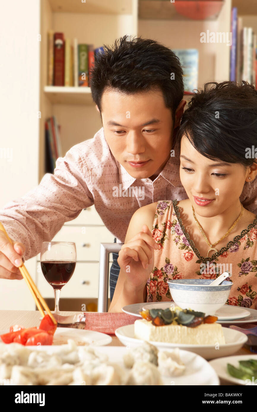 Couple At The Dinner Table Stock Photo - Alamy