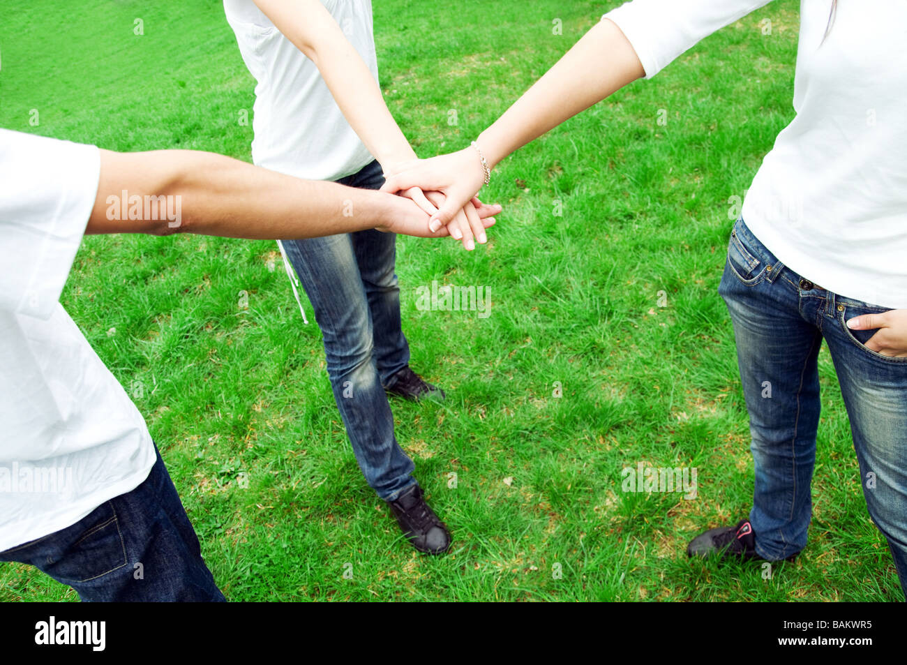 Group of friends joining hands. Unity, teamwork concept Stock Photo - Alamy