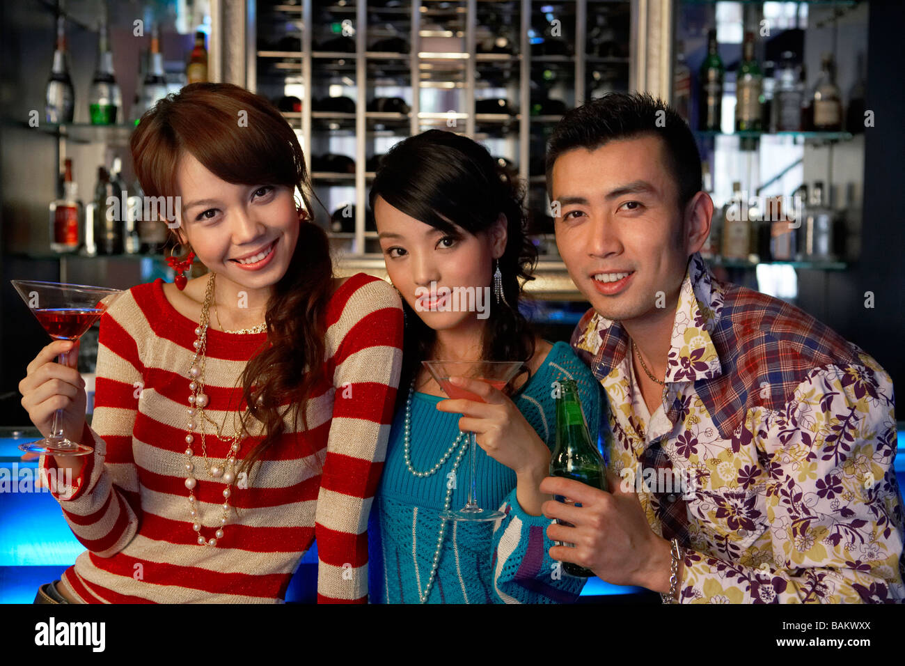 Young People Drinking Alcohol At Bar Stock Photo - Alamy