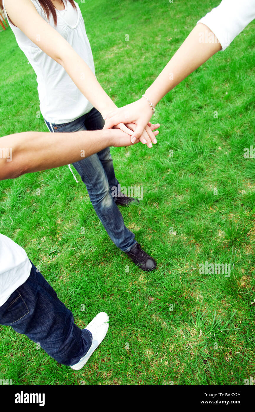 Group of friends joining hands. Unity, teamwork concept Stock Photo - Alamy