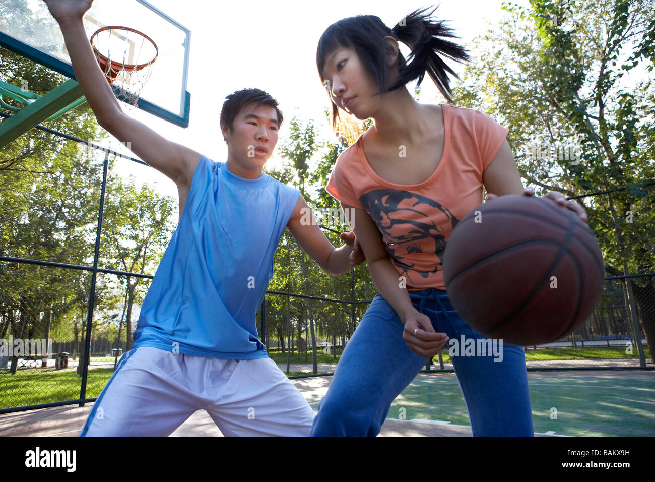 Young People Playing Basketball Stock Photo - Alamy
