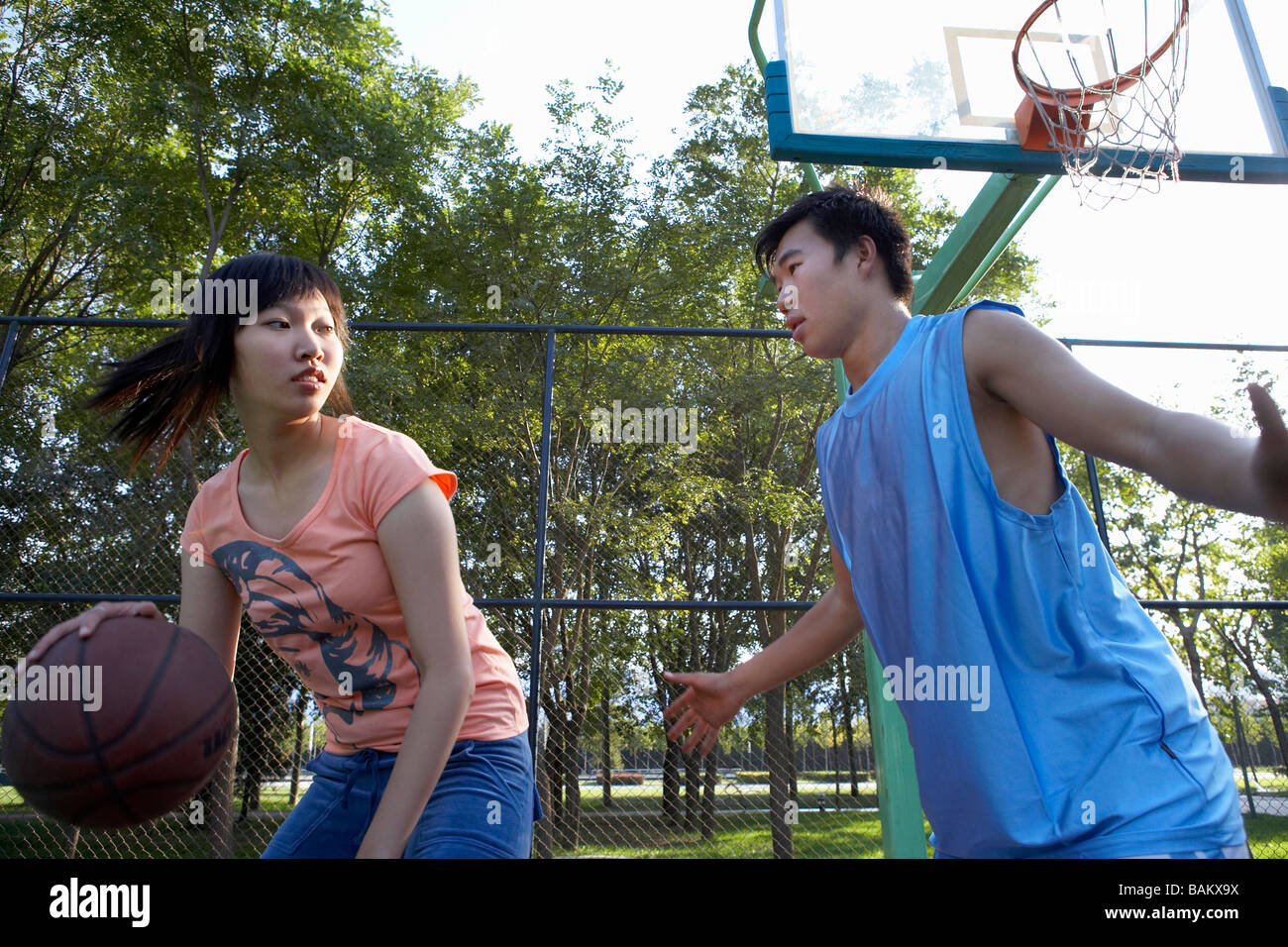 Young People Playing Basketball Stock Photo - Alamy