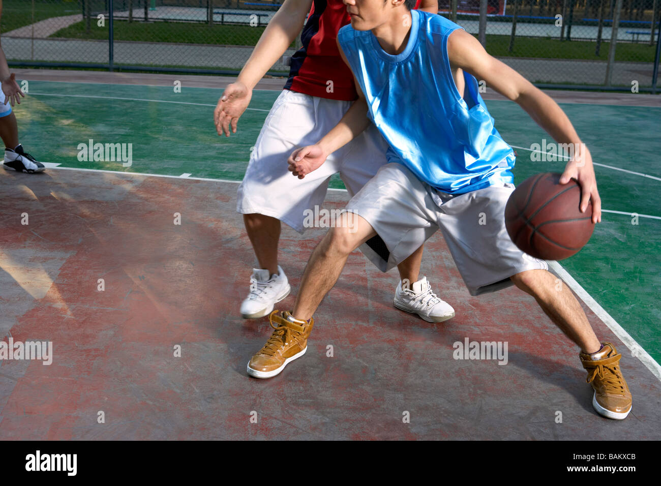 Young Men Playing Basketball Stock Photo - Alamy Young Men Playing Basketball Stock Photo - Alamy