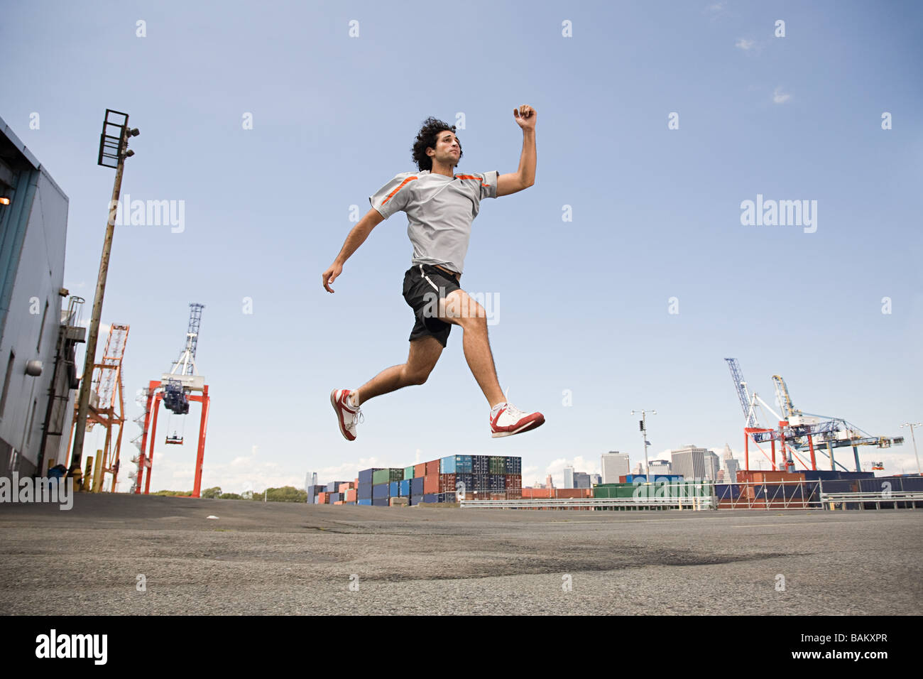 Man athlete jumping Stock Photo - Alamy
